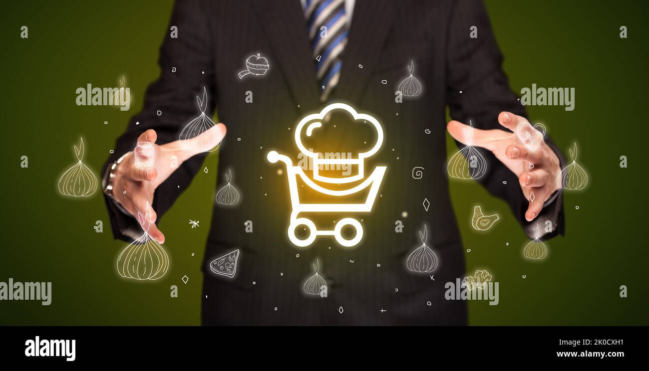 Hand holding food related icons Stock Photo - Alamy