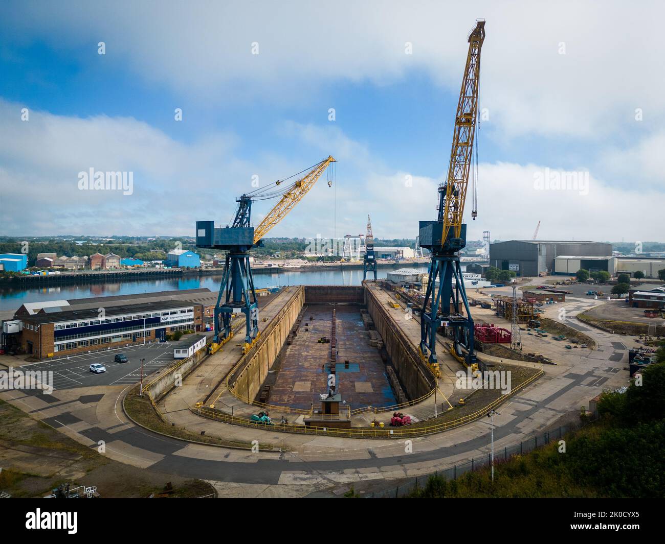 Aerial photo of a dry dock on Tyneside, River Tyne, with cranes. A&P ...
