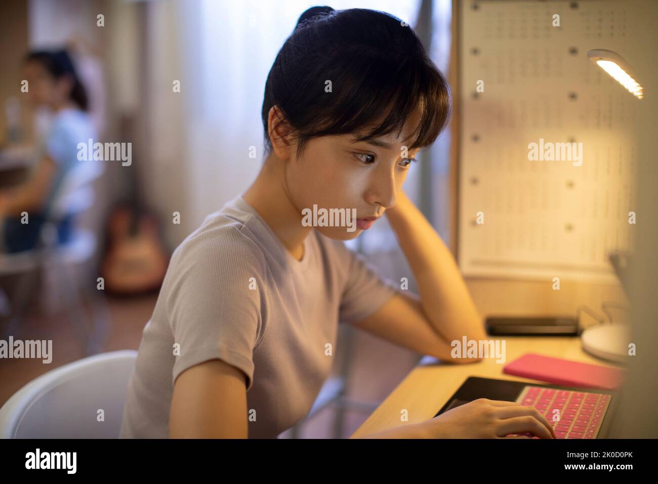 Young Chinese university student learning in dormitory Stock Photo - Alamy