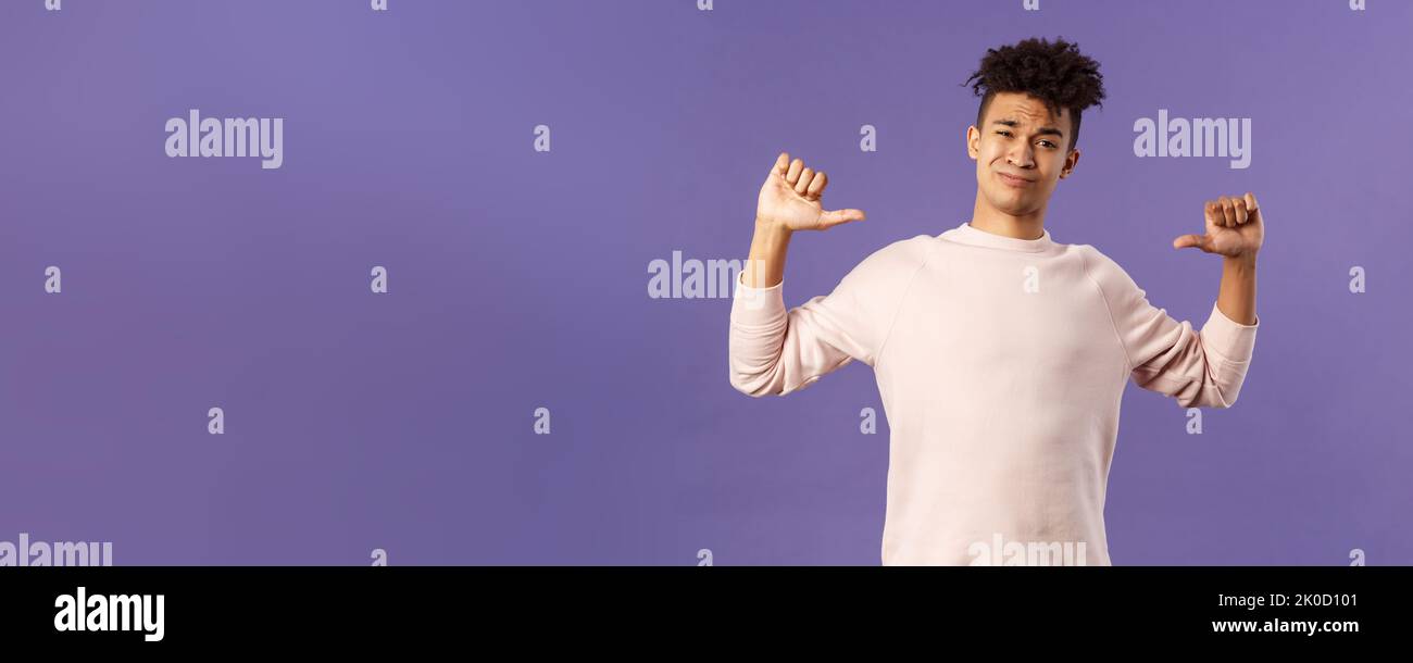 Portrait of boastful handsome young male student with dreads, bragging ...