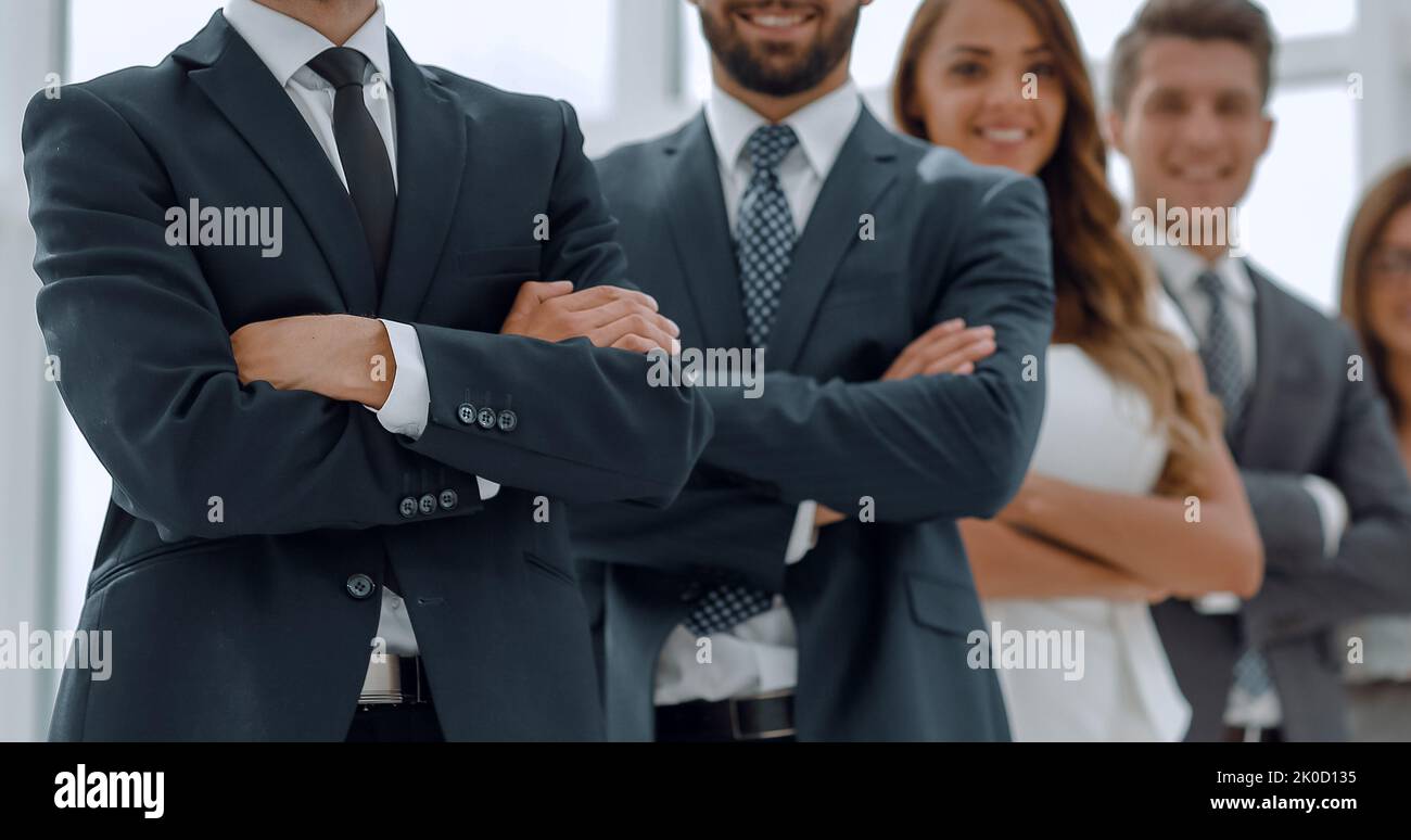 company employees standing together Stock Photo - Alamy
