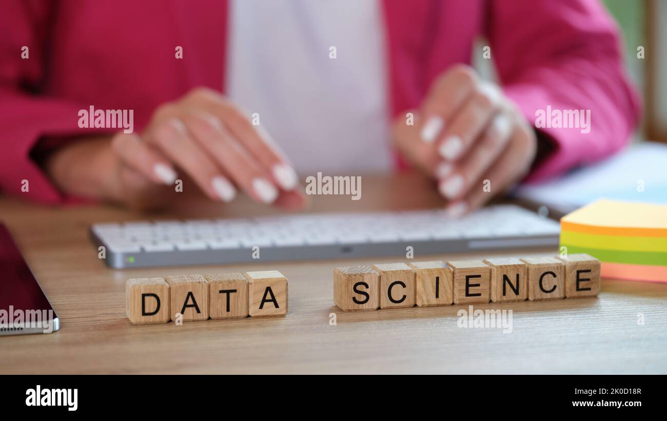 Woman is typing scientific data graphs and statistics on keyboard Stock ...