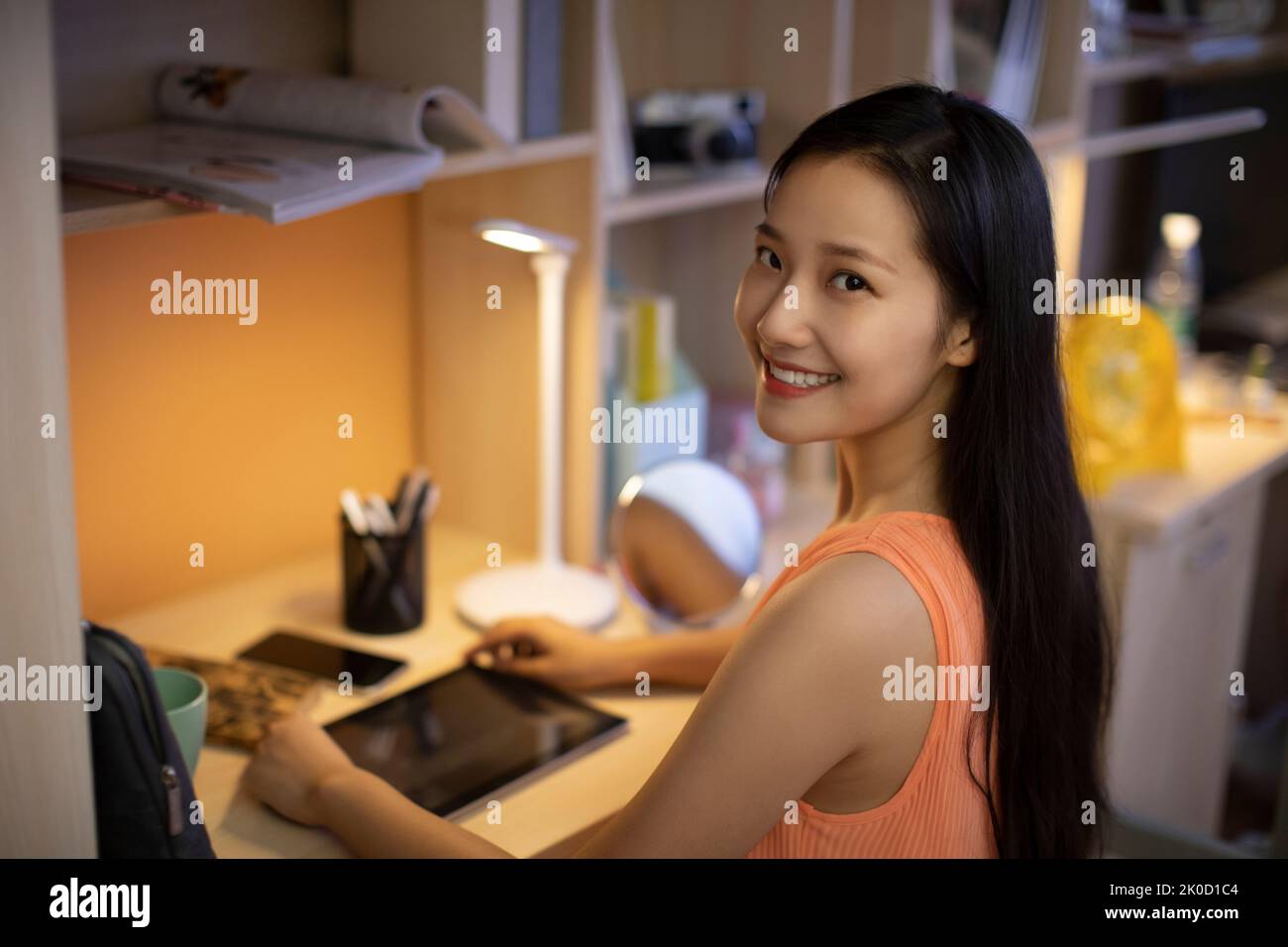 Young Chinese university student learning in dormitory Stock Photo - Alamy