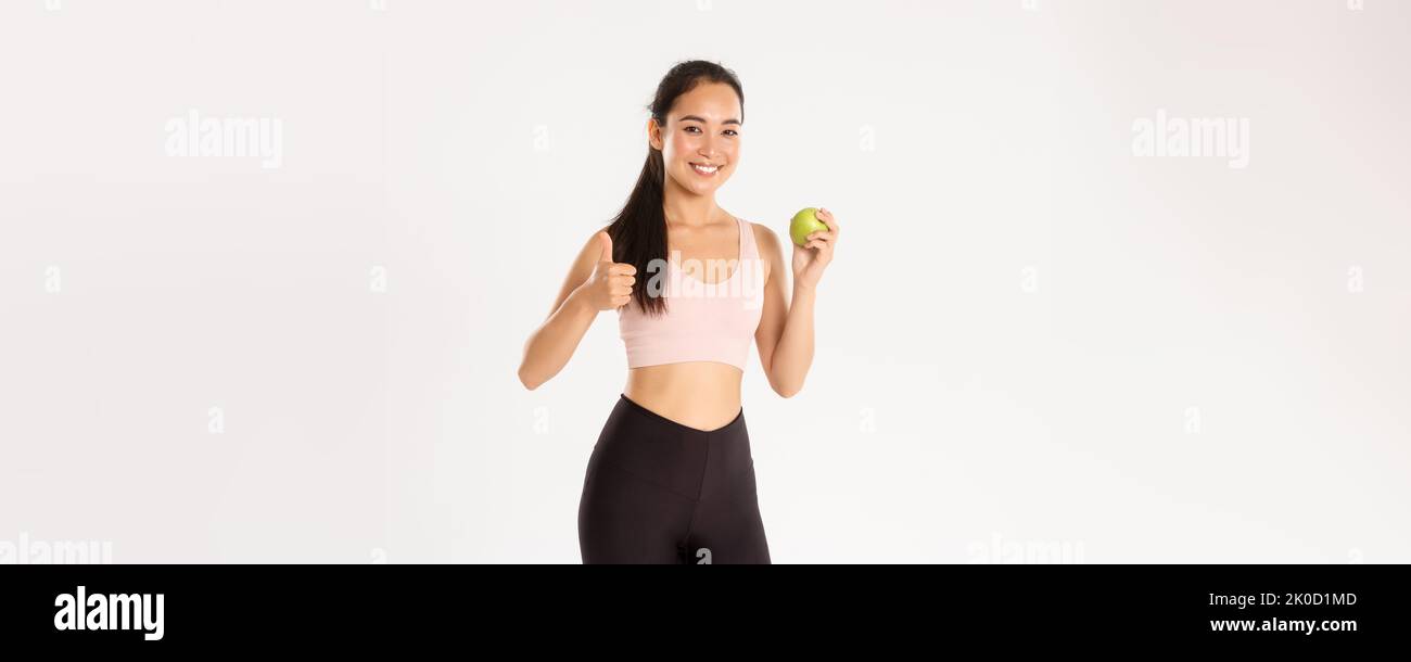 Sport, wellbeing and active lifestyle concept. Slim and healthy cute ...