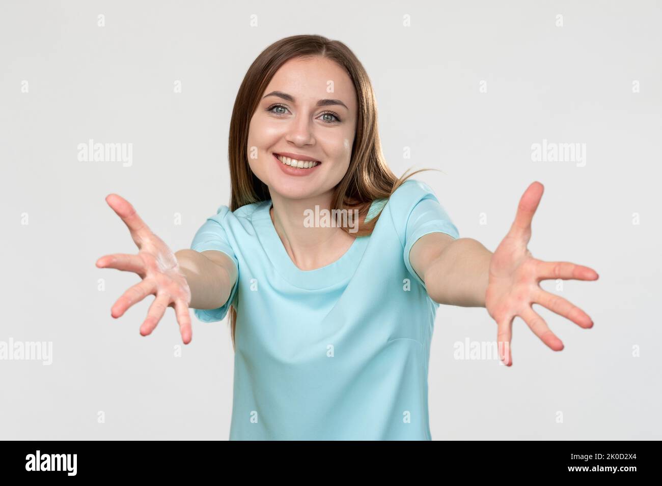 free hugs welcoming gesture cheerful woman hands Stock Photo - Alamy