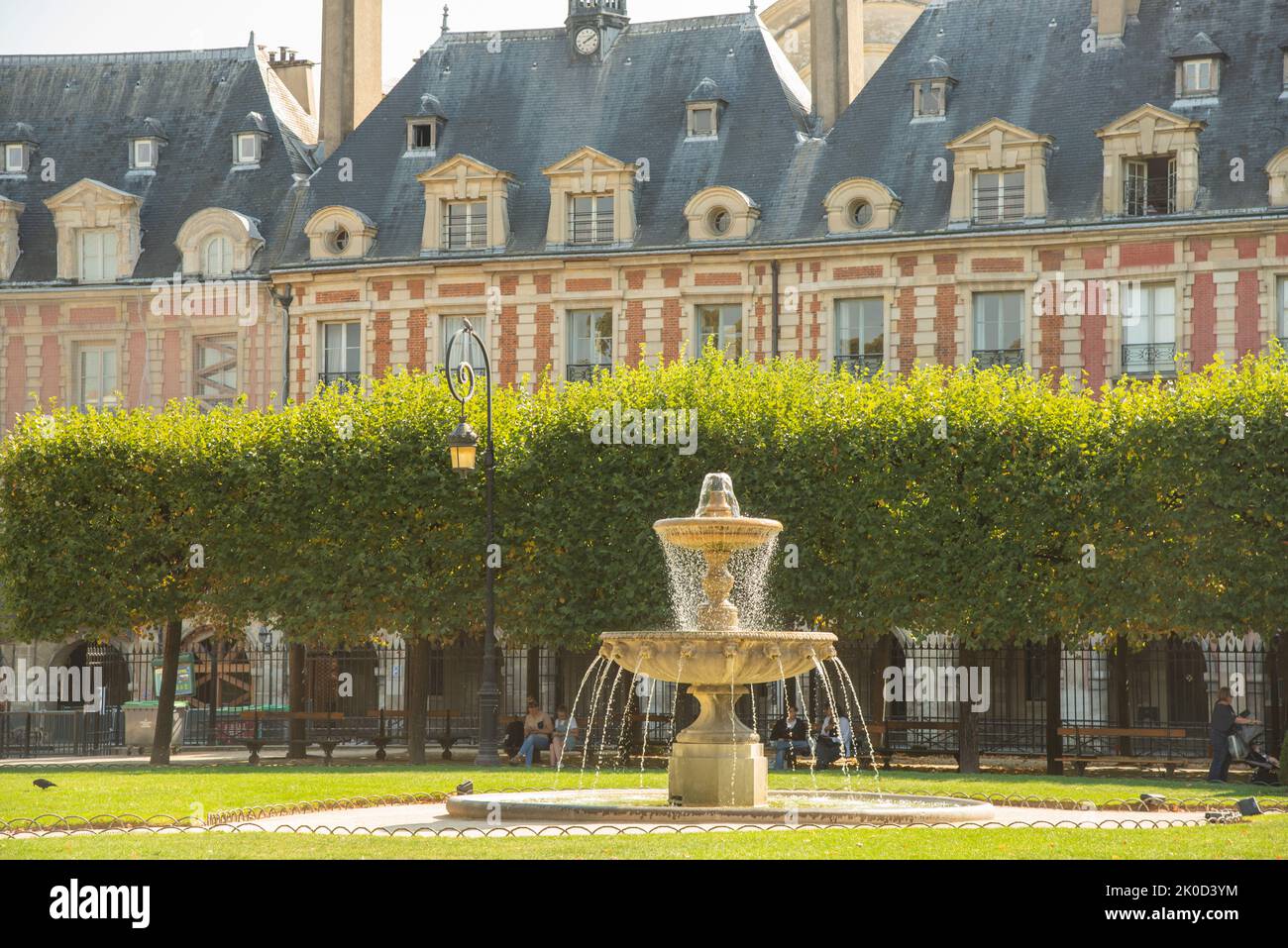 Paris, France. August 2022. Place de Vosges is one of most beautiful ...
