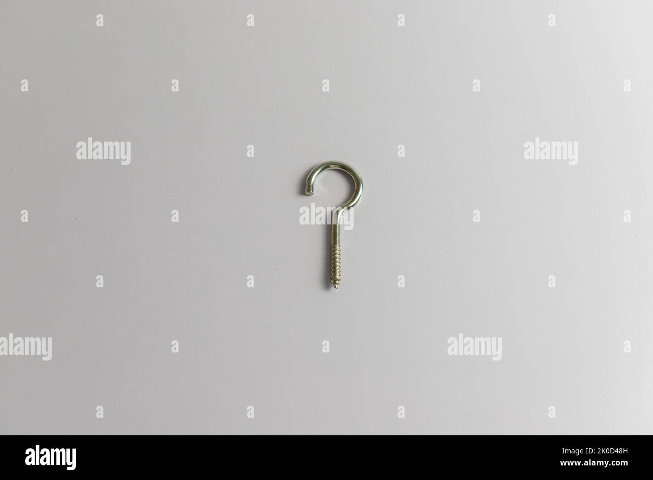 Stillness steel hook question mark sign screw on isolated white ...