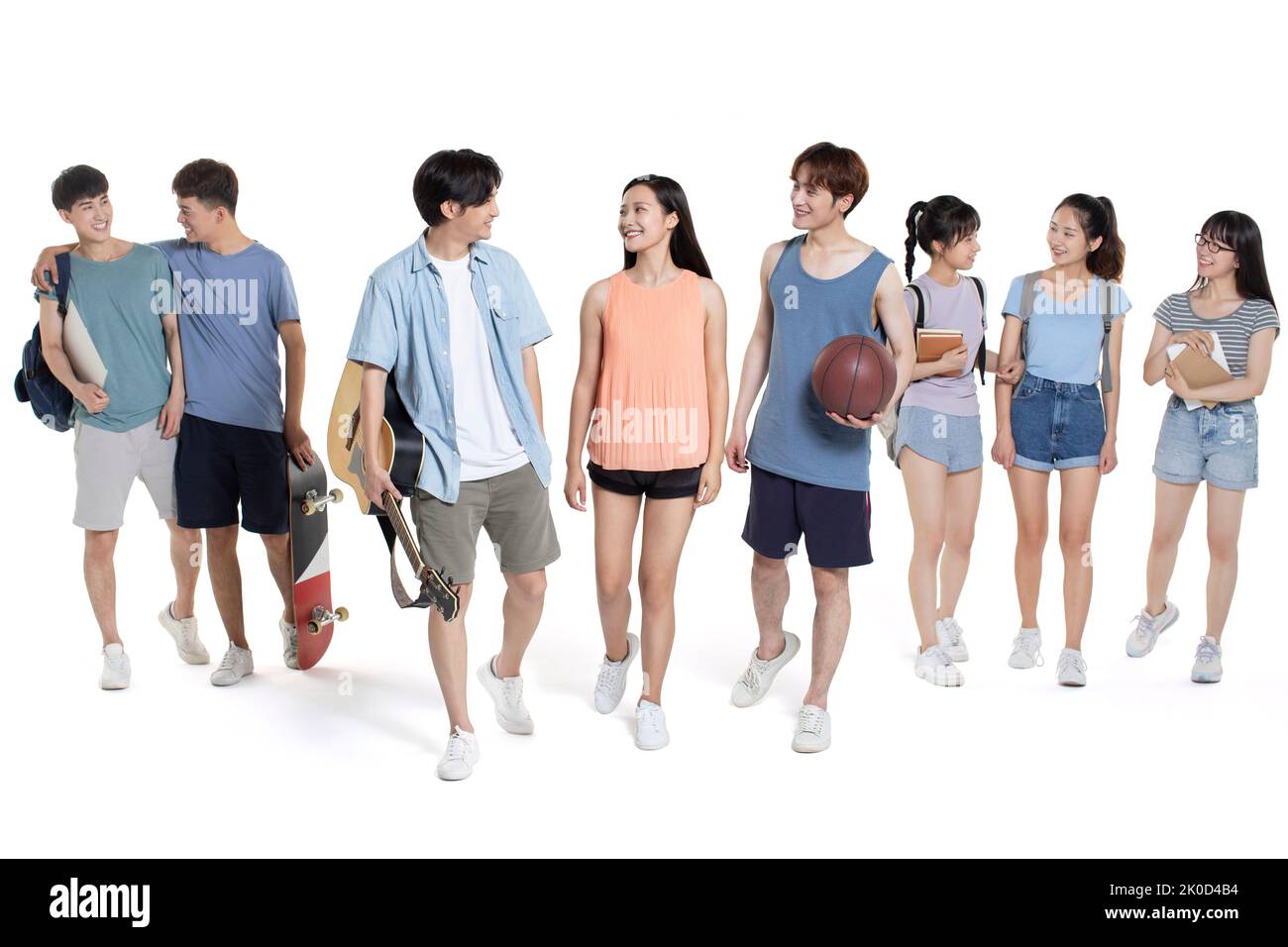 Studio shot of cheerful Chinese college students Stock Photo - Alamy