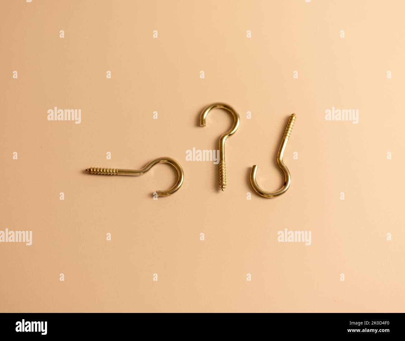 Question mark shape screw hooks Stock Photo - Alamy