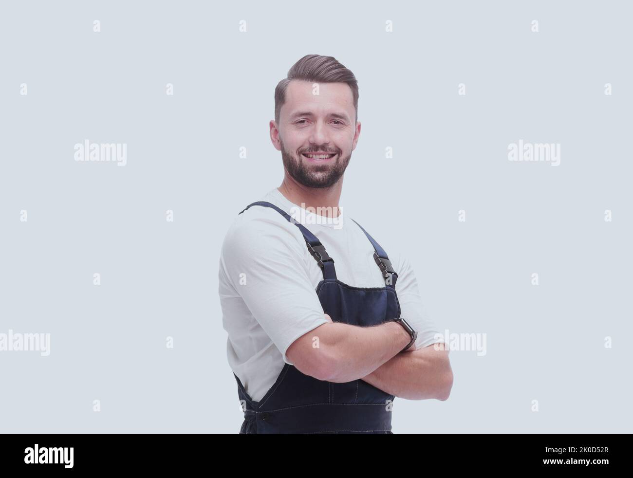 side view. smiling man in overalls looking forward to copy space Stock ...