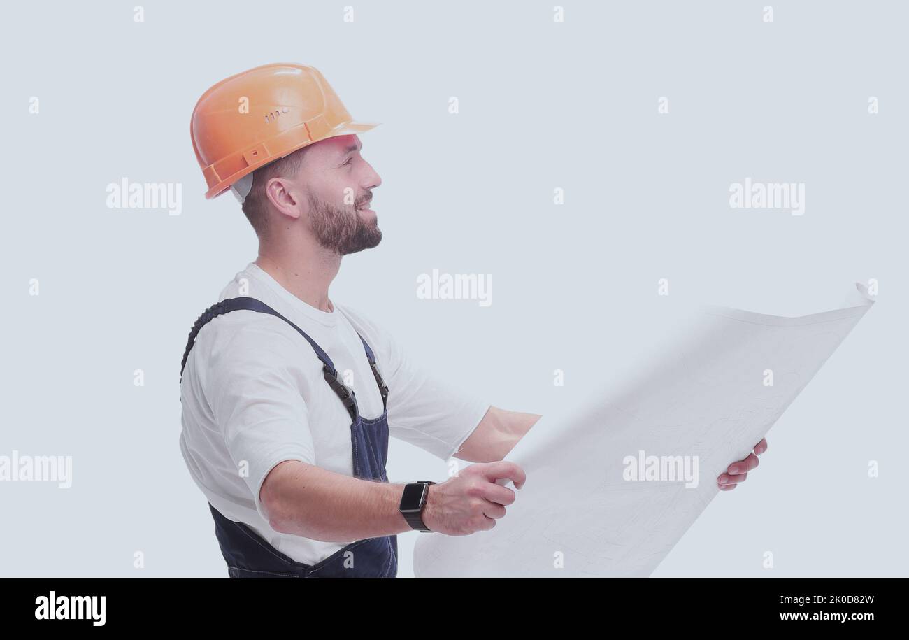 competent foreman Builder looking at drawings. isolated on white Stock ...