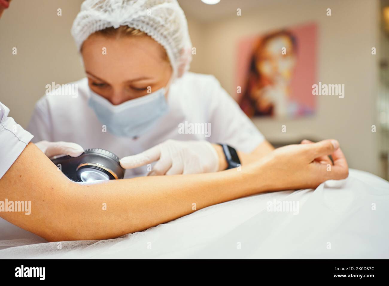 A dermatologist examines the skin Stock Photo - Alamy