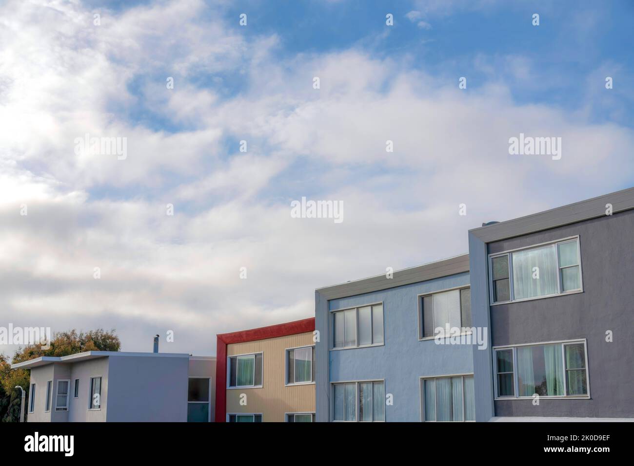 Sloped modern houses against the cloudy sky in San Francisco ...