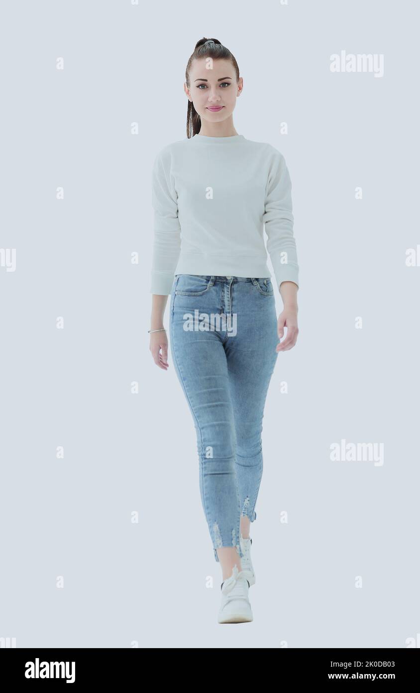 in full growth. a nice young woman, stepping forward Stock Photo - Alamy