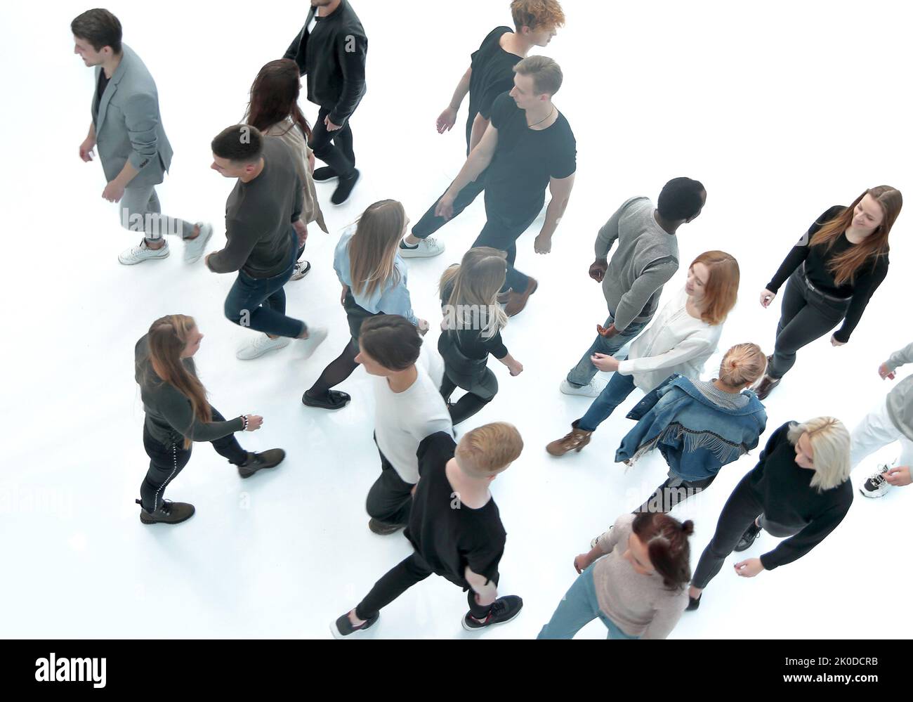 top view . groups of young people walking in different directions Stock ...