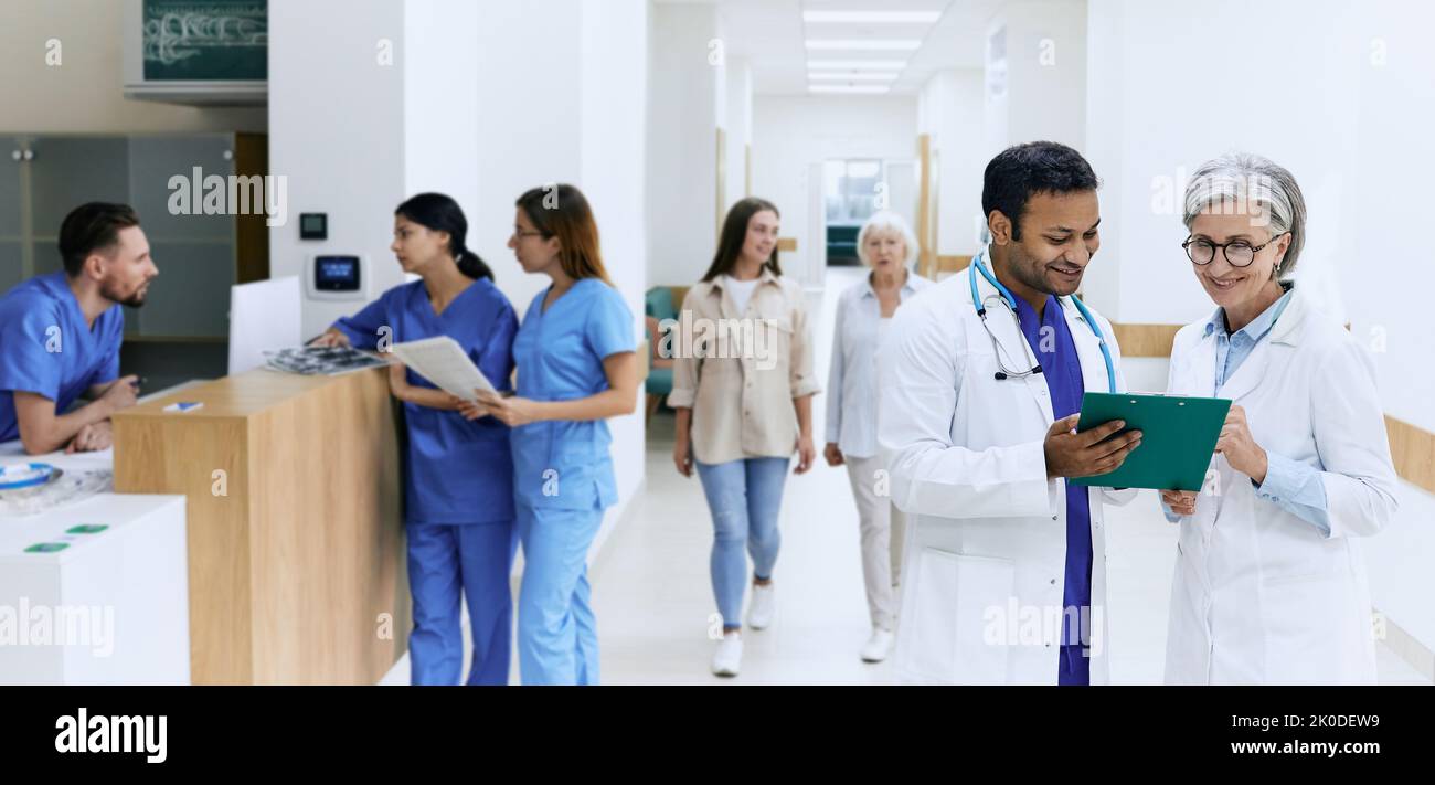 Asian male reception desk hi-res stock photography and images - Alamy