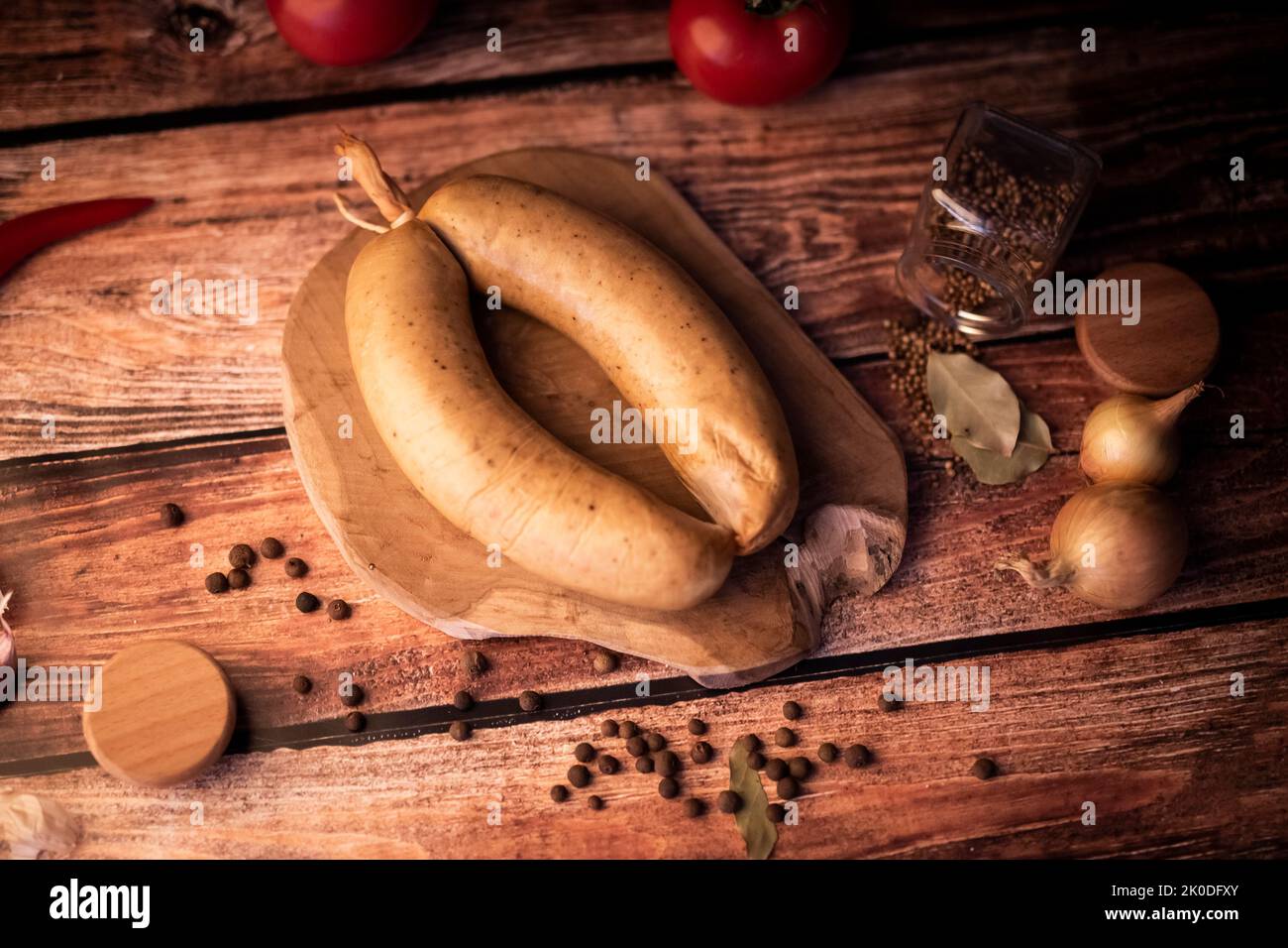 Top view of sausage, on a wood background. Traditional meat sausage, a ...