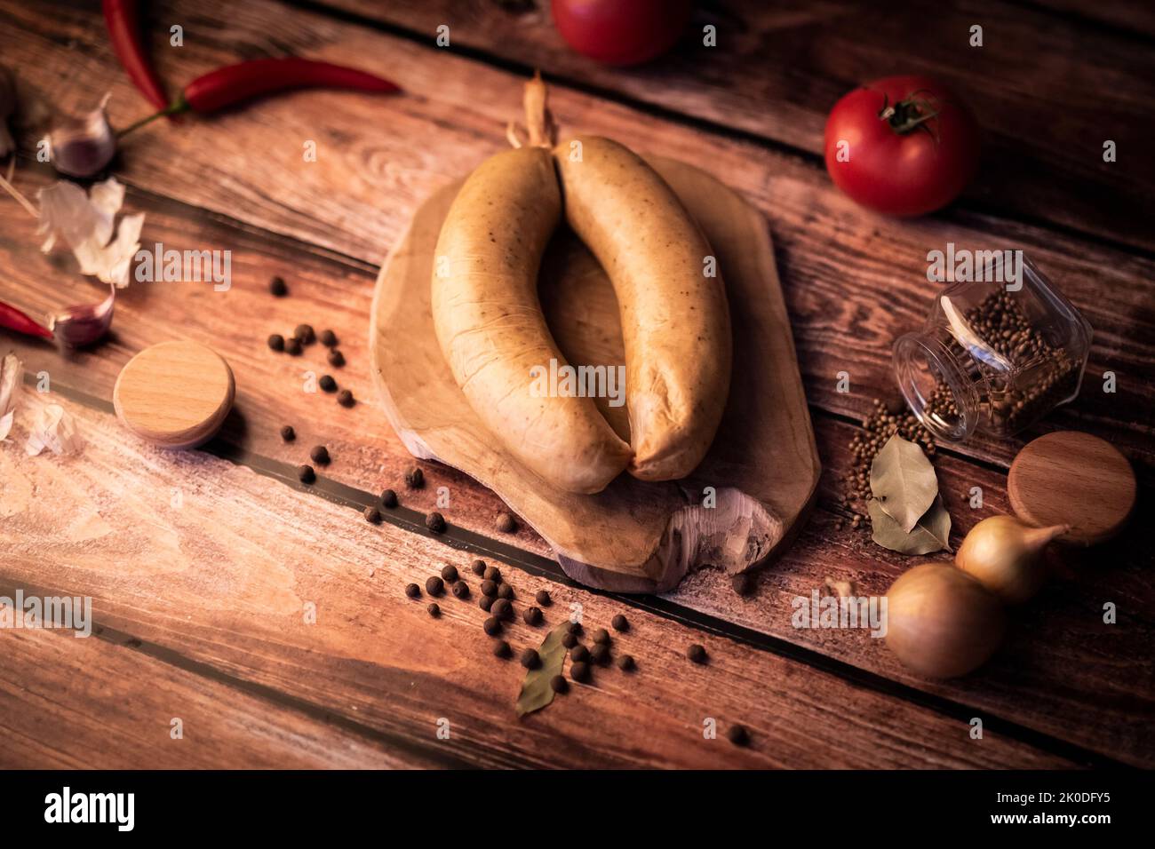 Top view of sausage, on a wood background. Traditional meat sausage, a ...