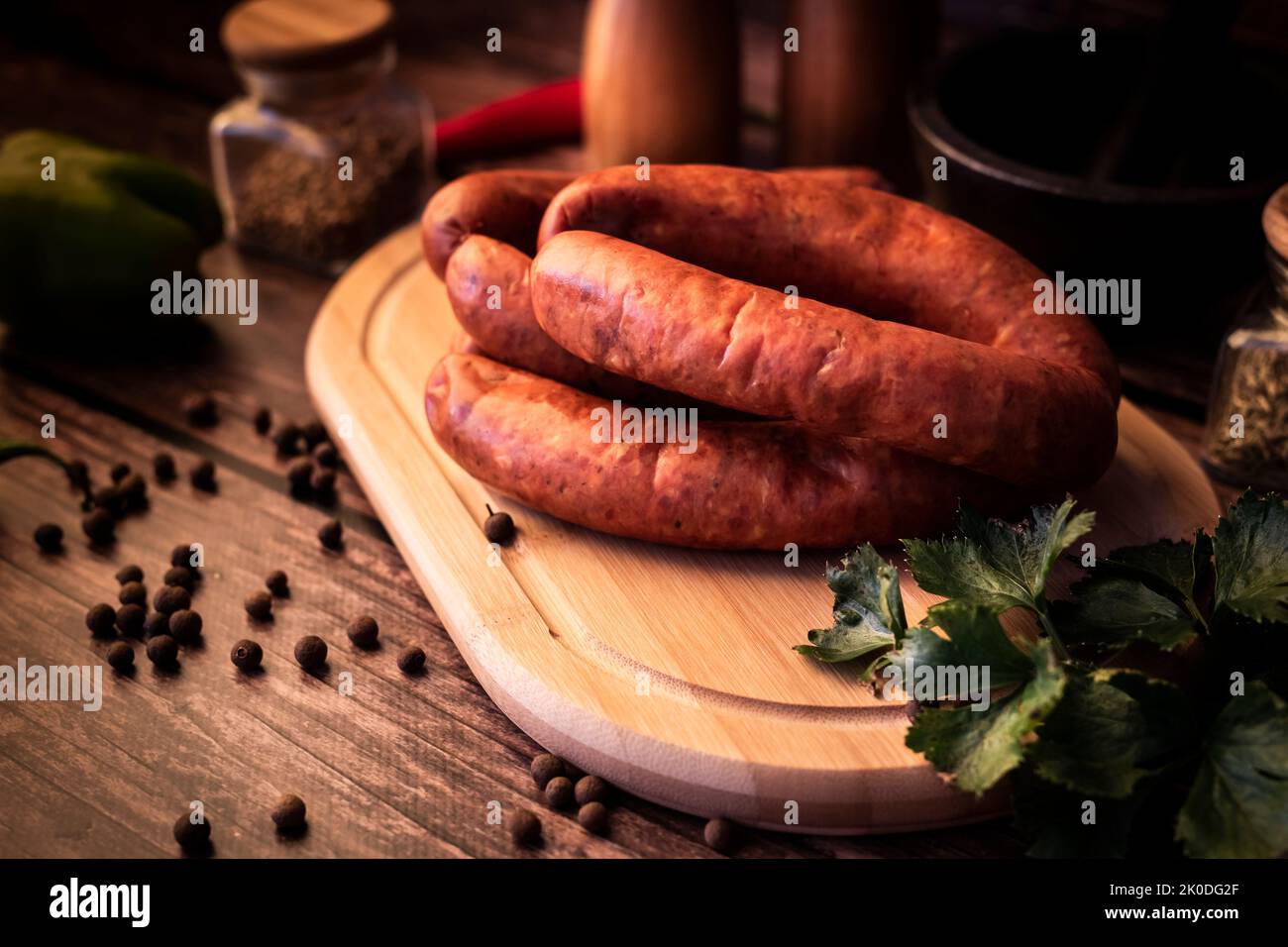 Top view of sausage, on a wood background. Traditional meat sausage, a ...