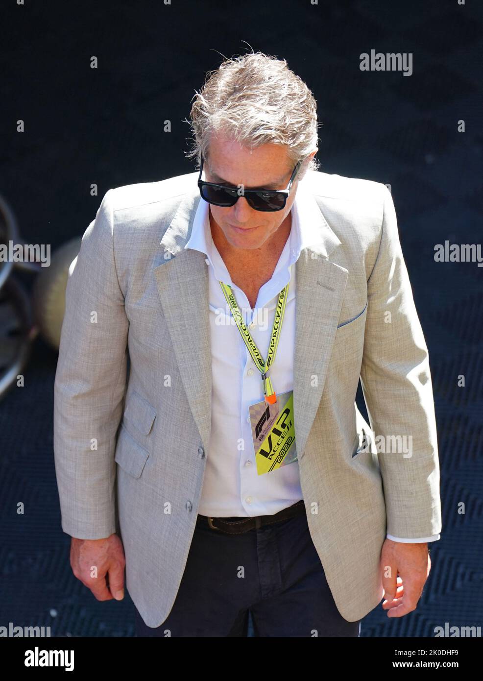 British actor Hugh Grant in the Ferrari garage before the Italian Grand ...