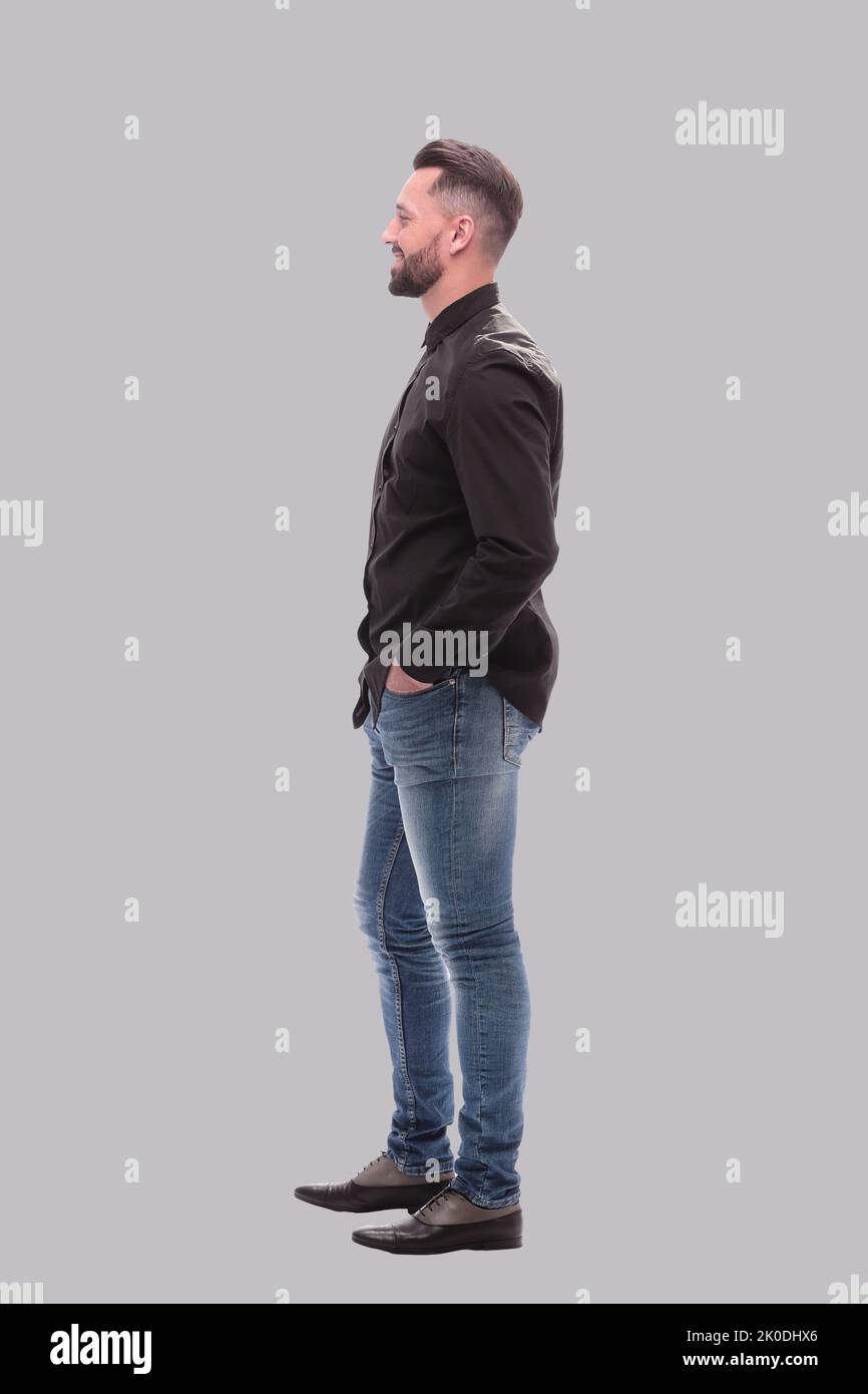 side view. modern young man in jeans Stock Photo - Alamy