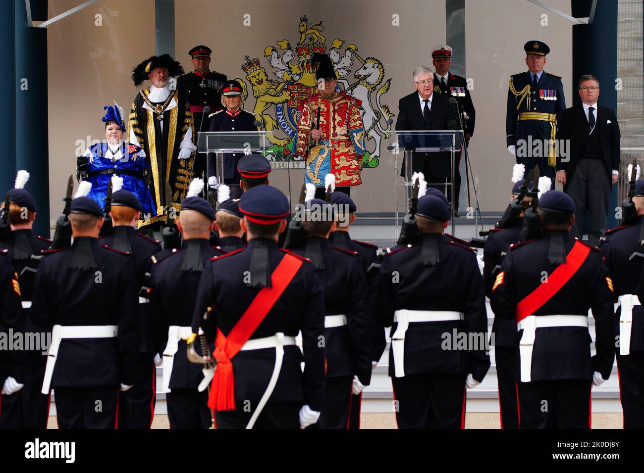 First Minister of Wales Mark Drakeford (right) speaks during an ...
