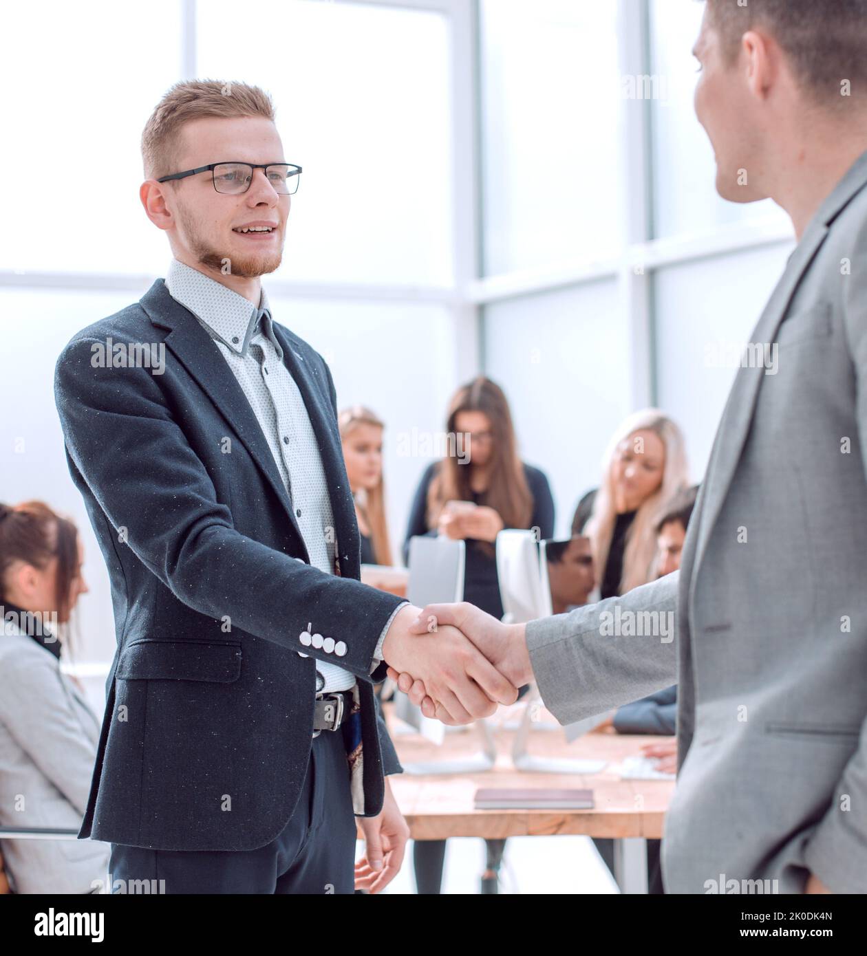 close up. handshake of business people on an office background Stock ...
