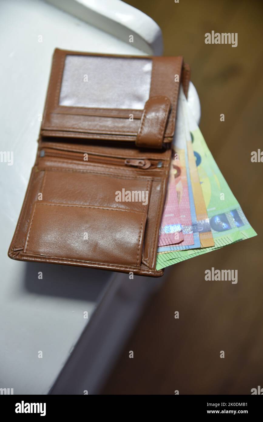 Pay small money hi-res stock photography and images - Alamy