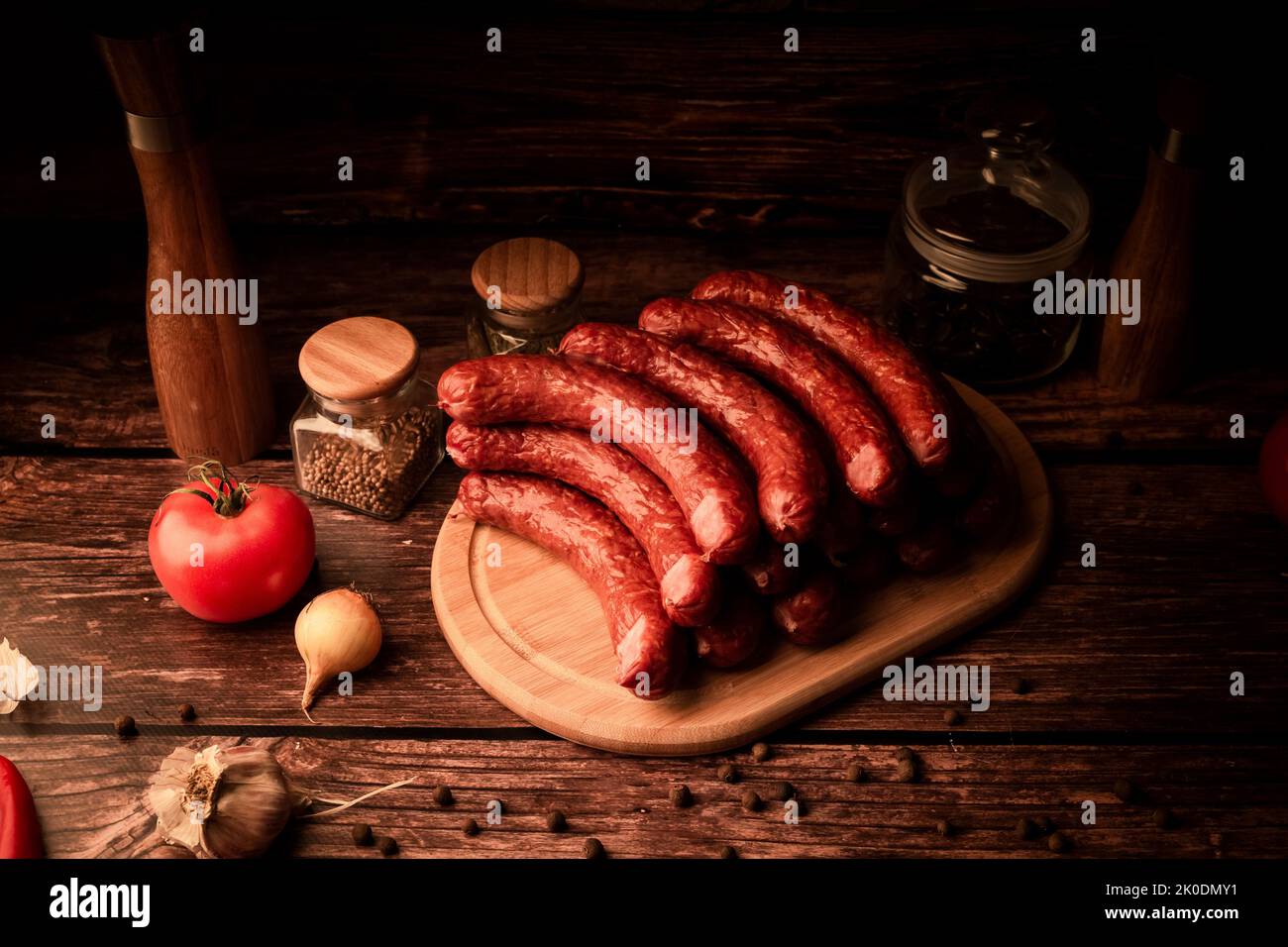 Top view of sausage, on a wood background. Traditional meat sausage, a ...