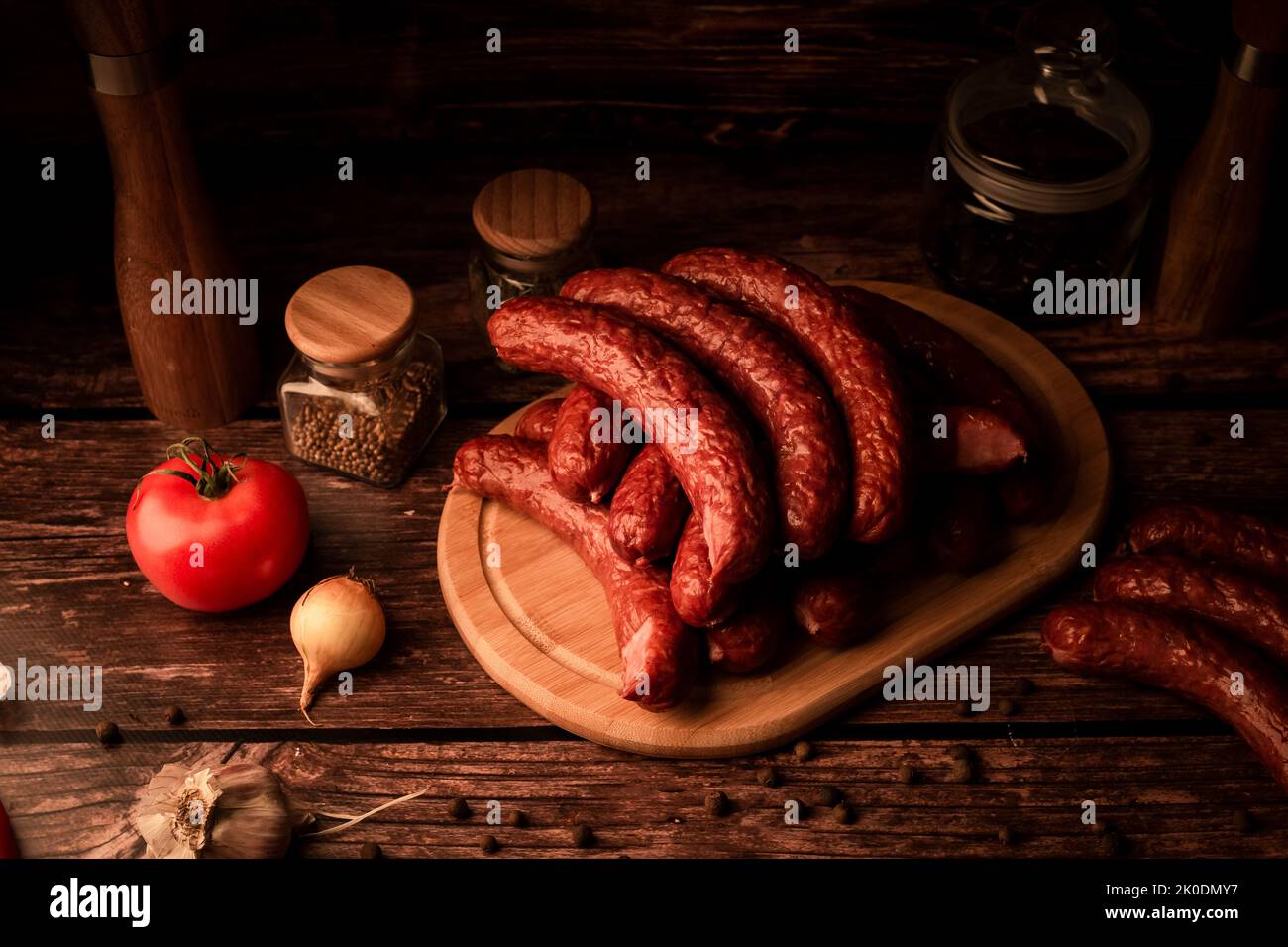 Top view of sausage, on a wood background. Traditional meat sausage, a ...