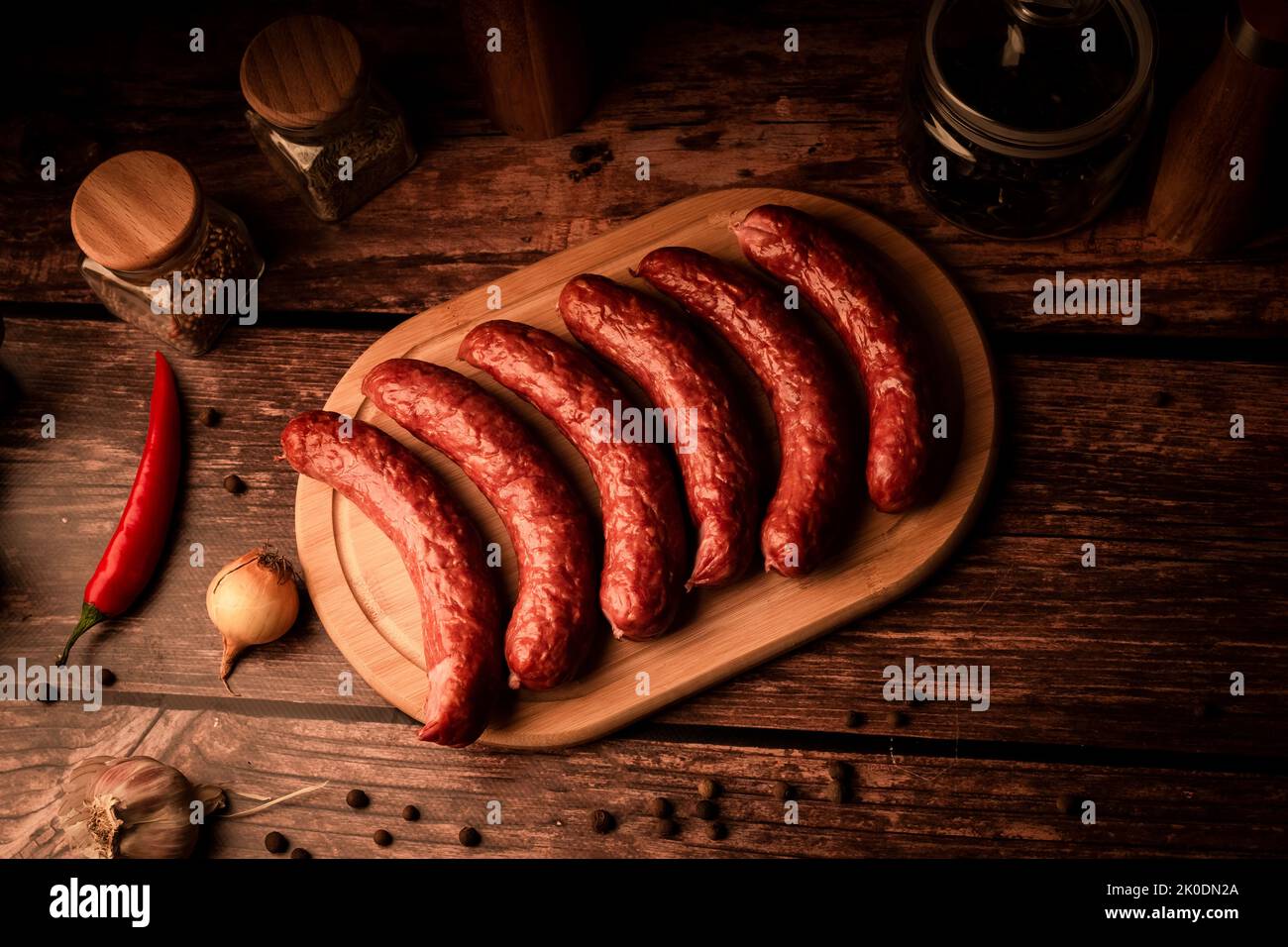 Top view of sausage, on a wood background. Traditional meat sausage, a ...