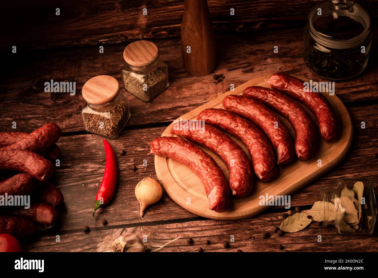 Top view of sausage, on a wood background. Traditional meat sausage, a ...
