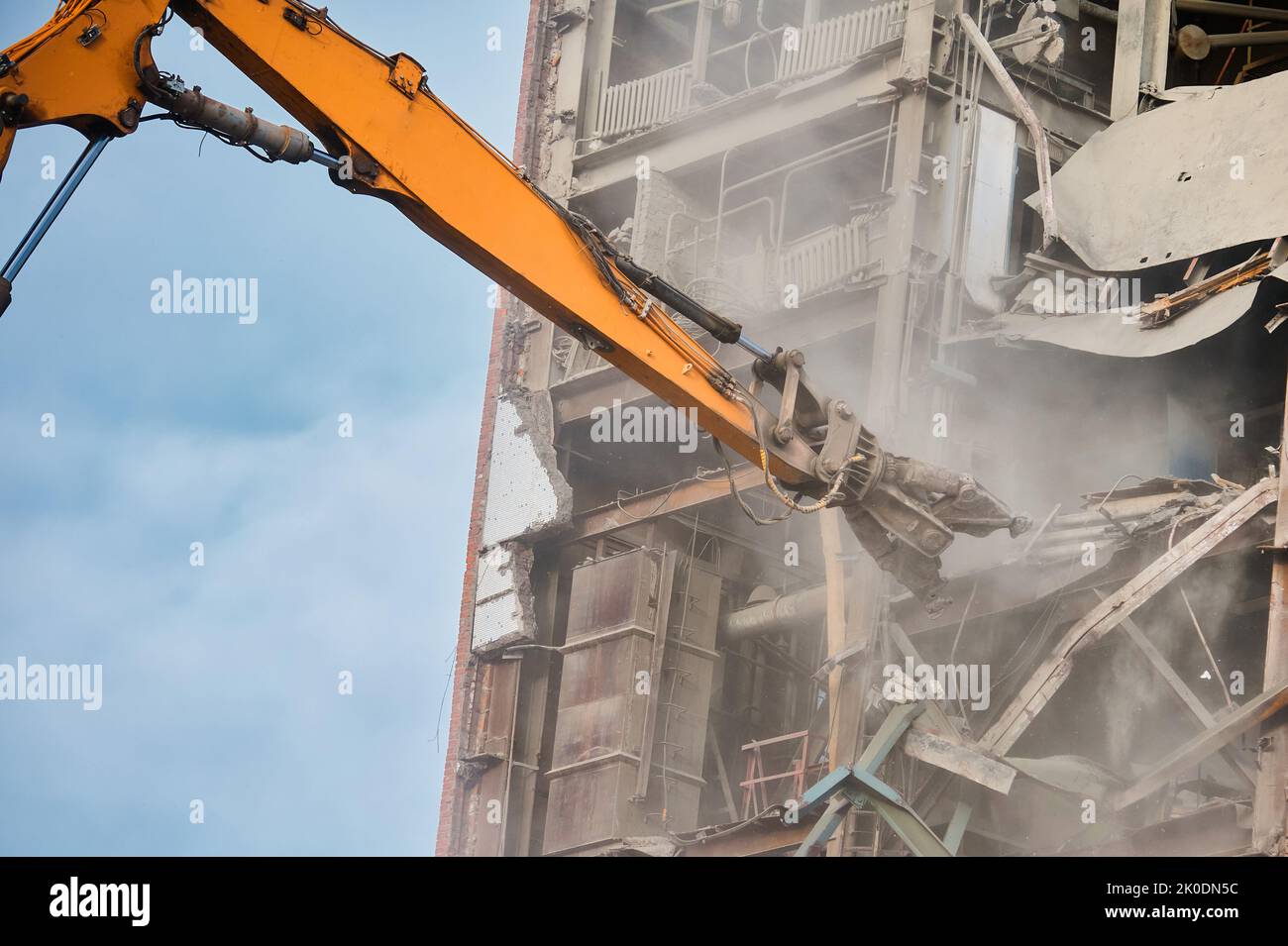 Destroying of old industrial building by excavator destroyer Stock ...