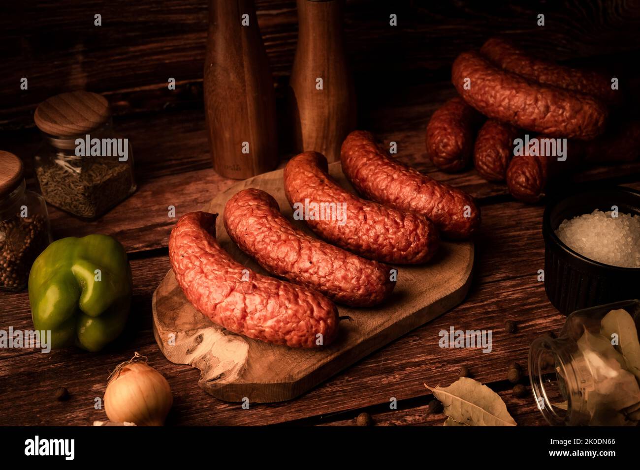 Top view of sausage, on a wood background. Traditional meat sausage, a ...