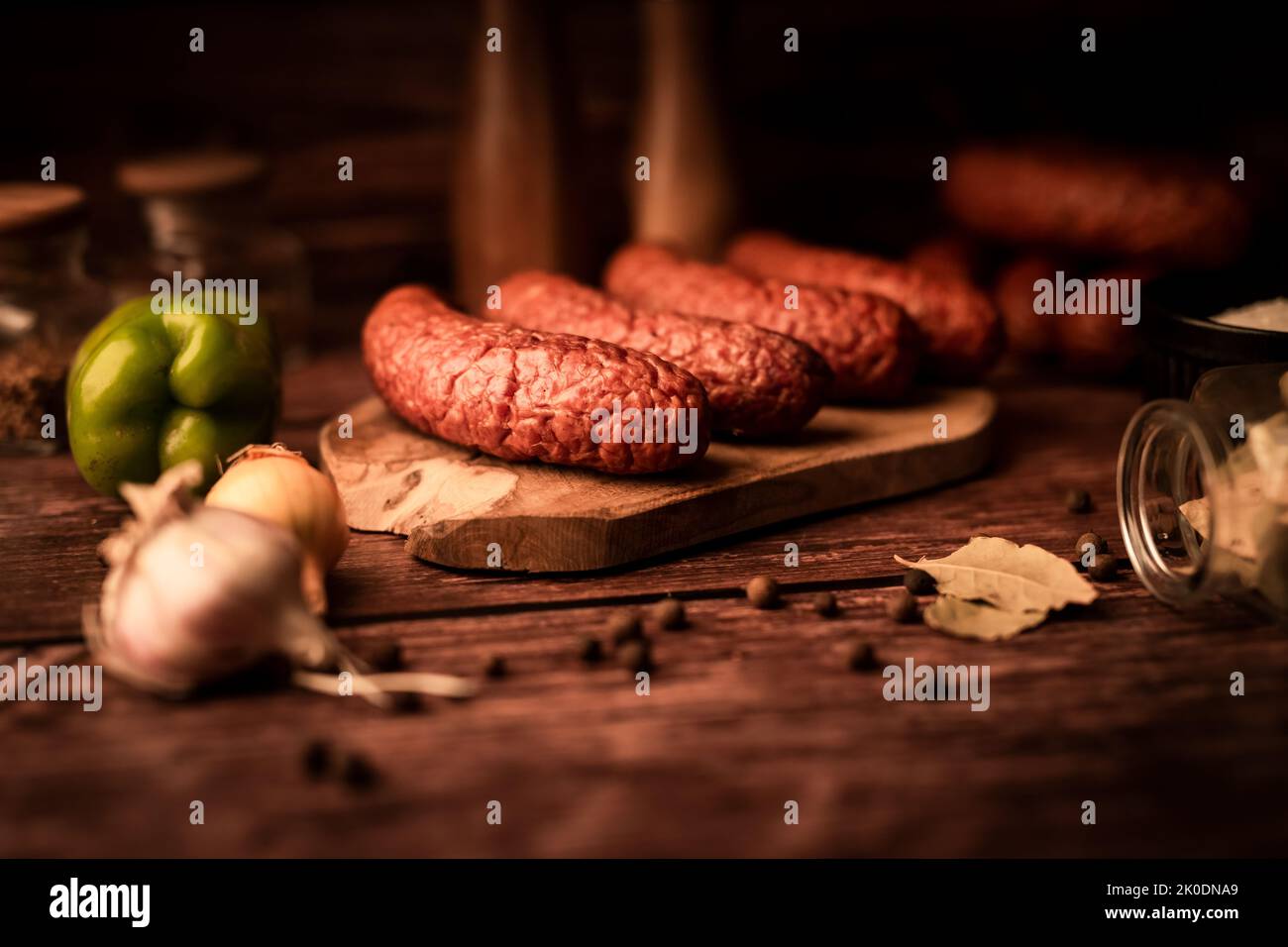 Top view of sausage, on a wood background. Traditional meat sausage, a ...