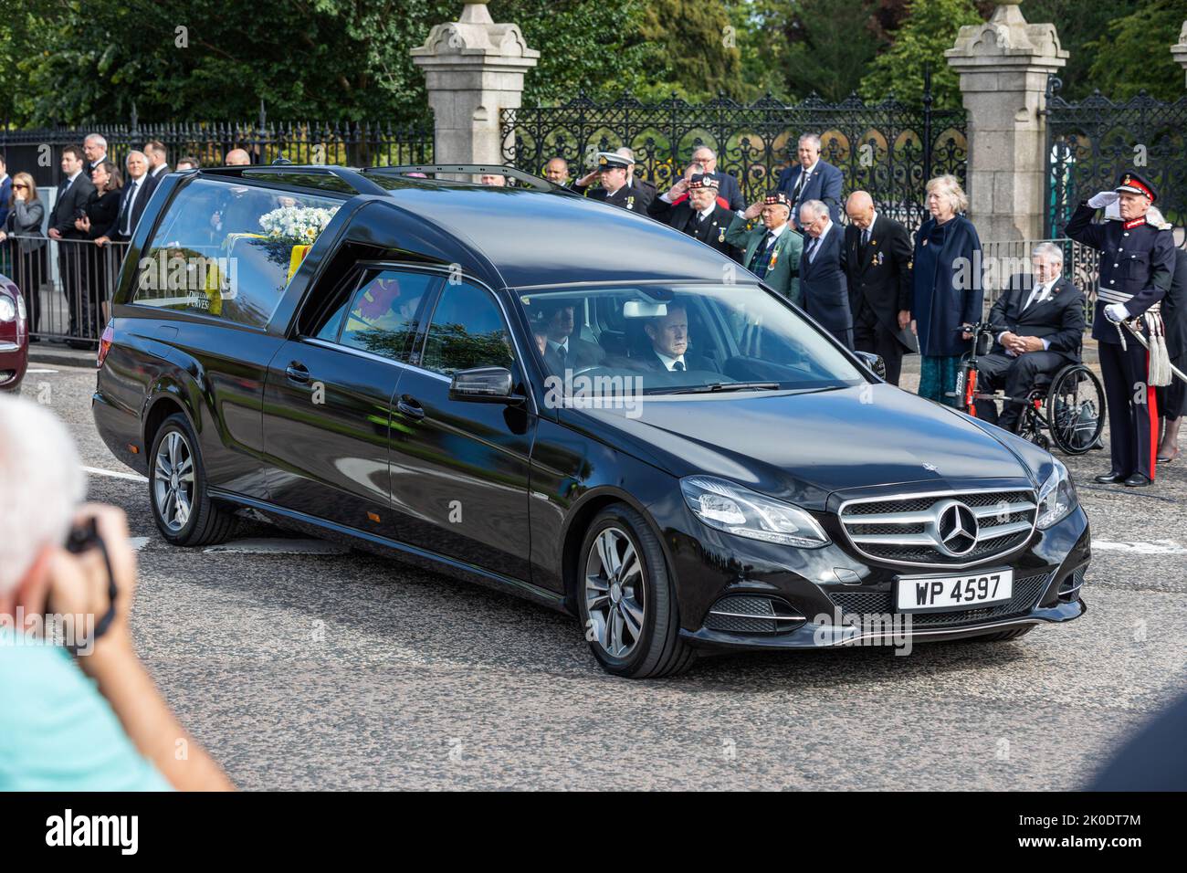 The hearse carrying the coffin of Queen Elizabeth II, draped with the Royal Standard of Scotland ...