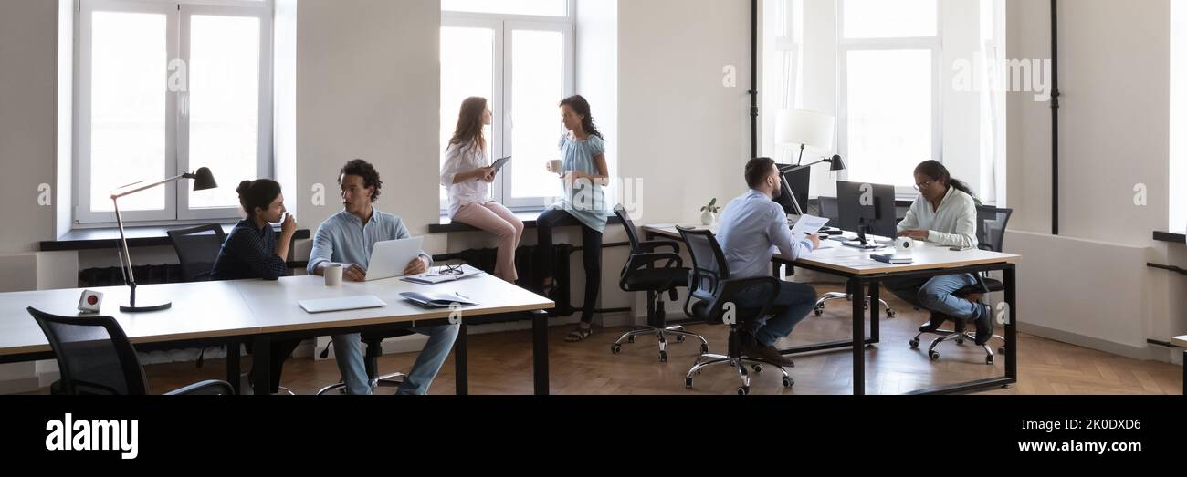 Modern office space with diverse working busy employees Stock Photo - Alamy