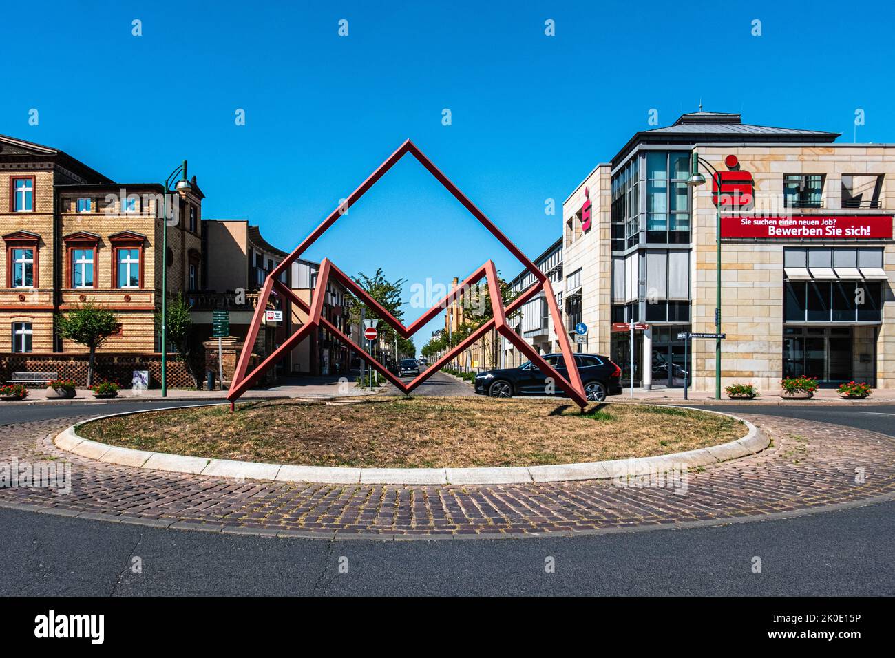 Abstract sculpture on traffic circle at junction Tiergartenstrasse ...