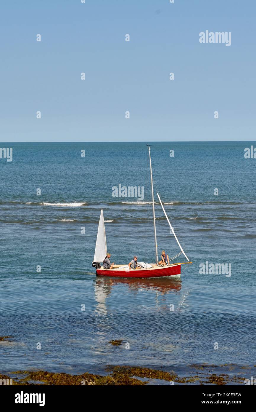 Newport, Pembrokeshire, Wales - August 2022: People sailing a small ...
