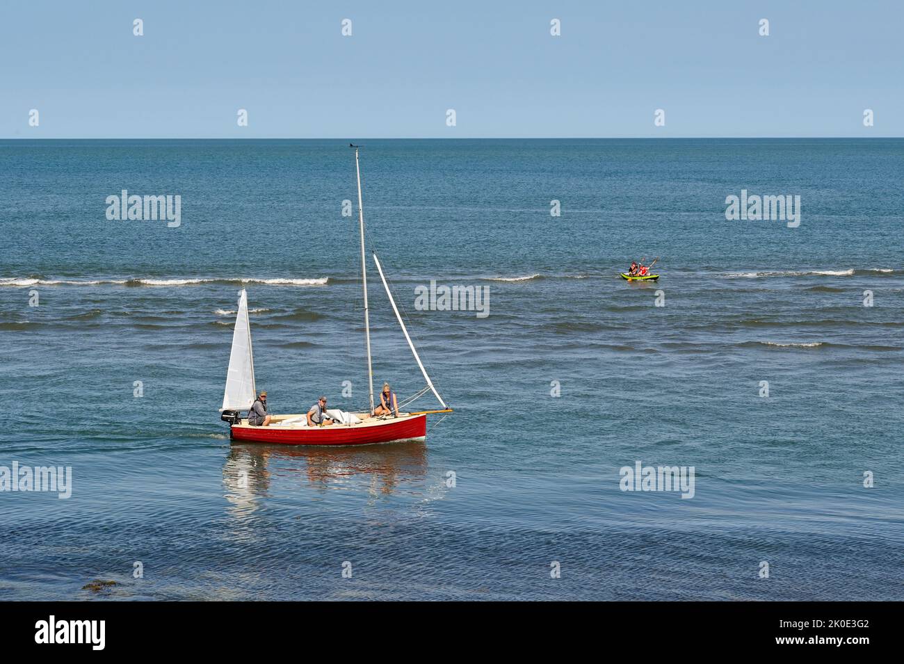 Newport, Pembrokeshire, Wales - August 2022: People sailing a small ...