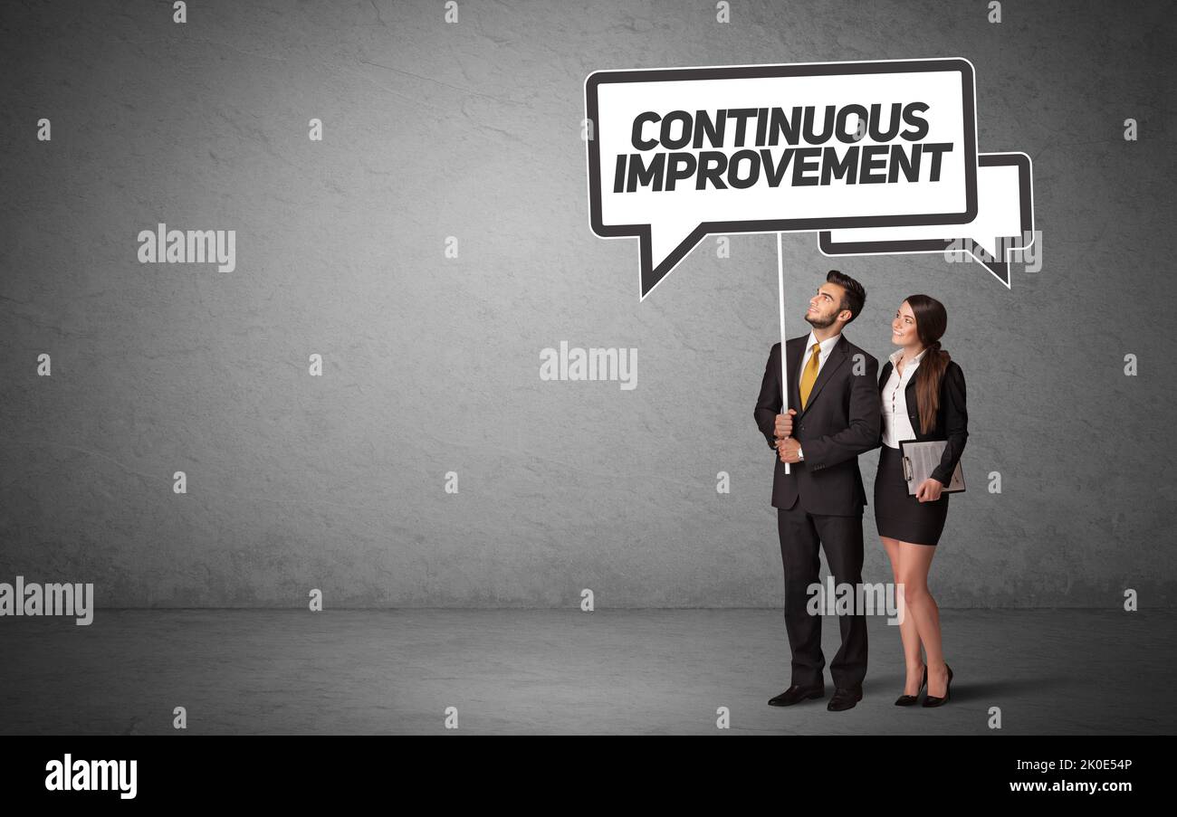 business person in casual holding road sign Stock Photo - Alamy