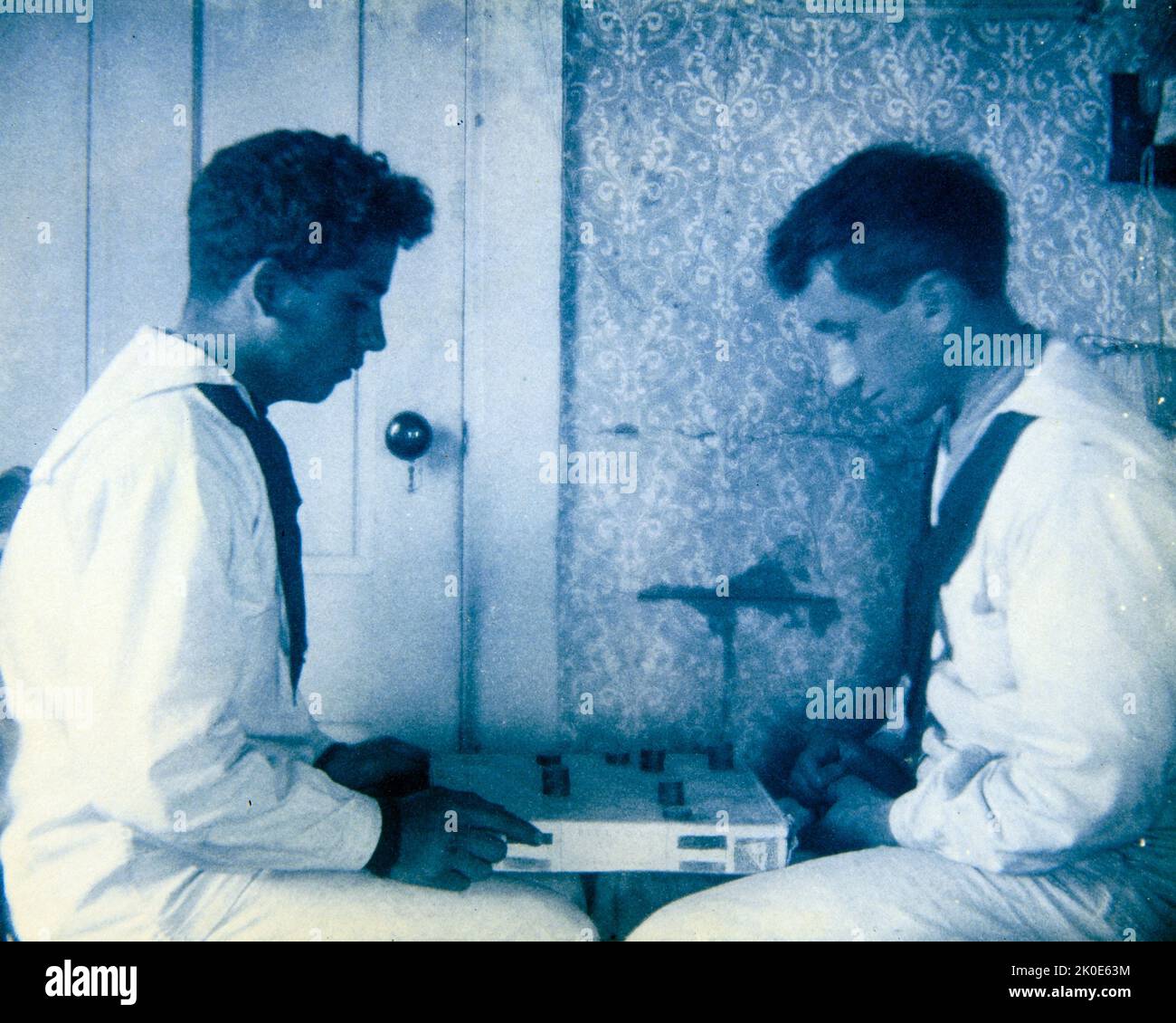Two boys in sailor suits, playing checkers, 1905 by Fred Holland Day ...