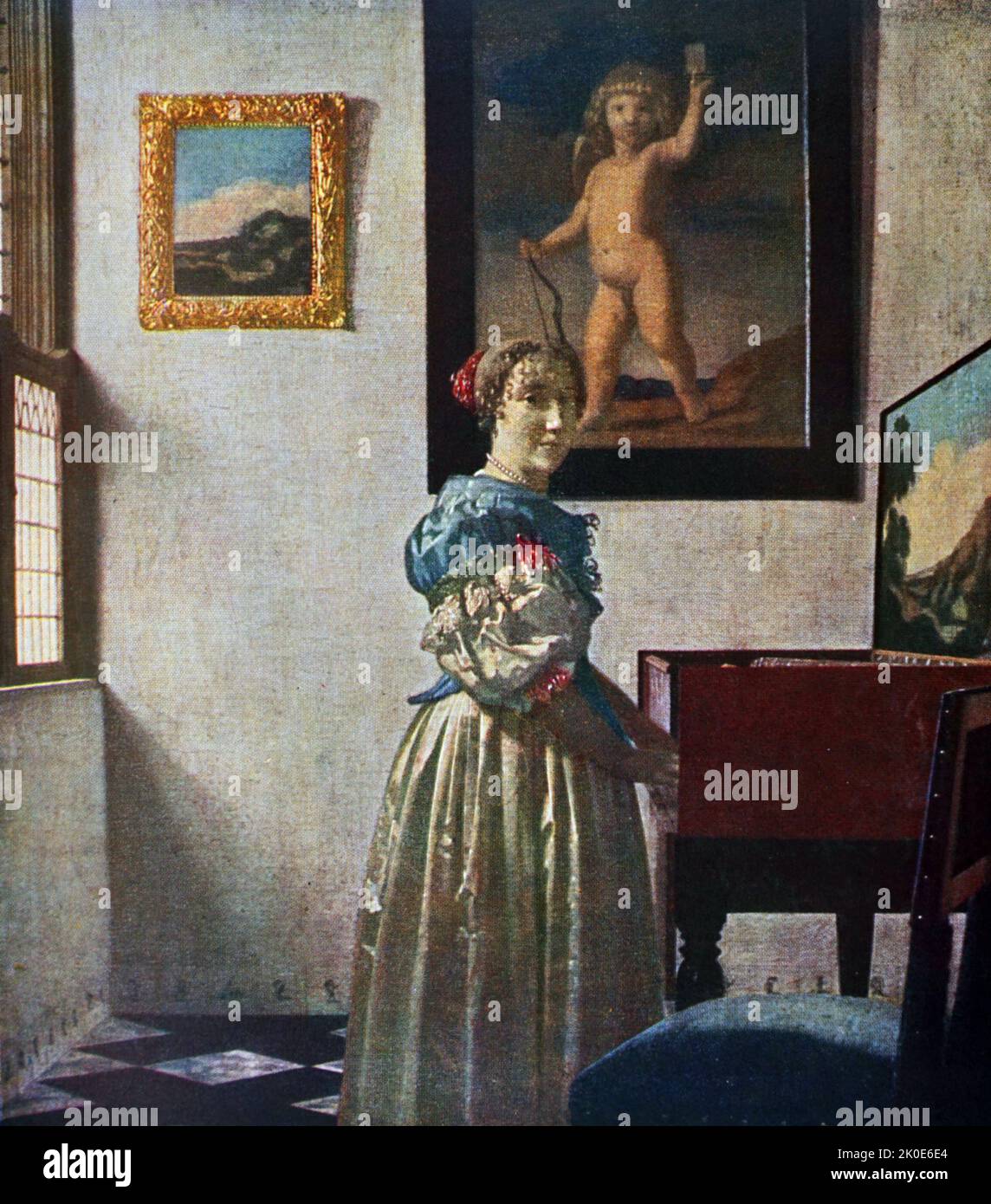 Lady Standing at a Virginal is a genre painting created by the Dutch ...