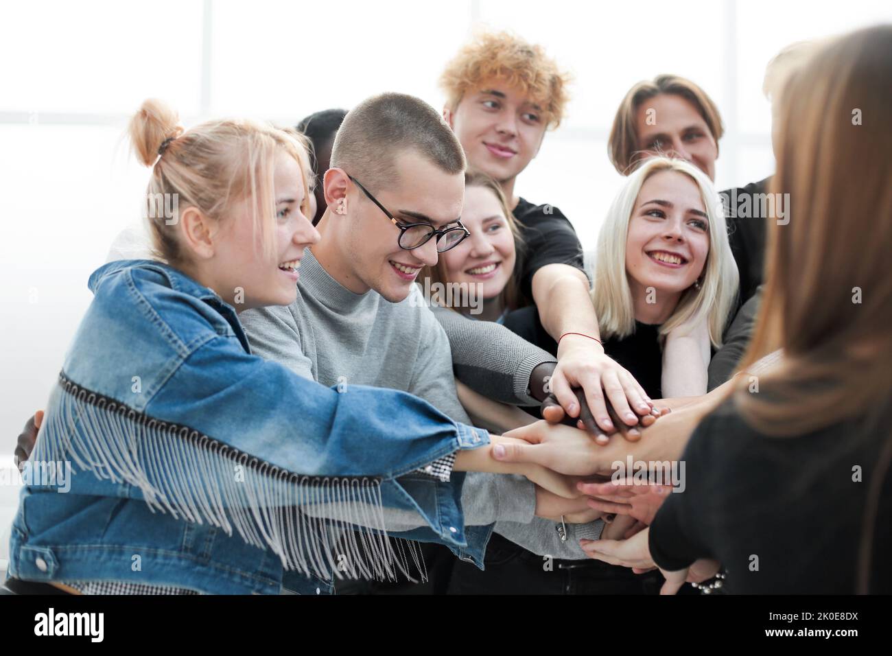 large group of young people showing their unity Stock Photo - Alamy