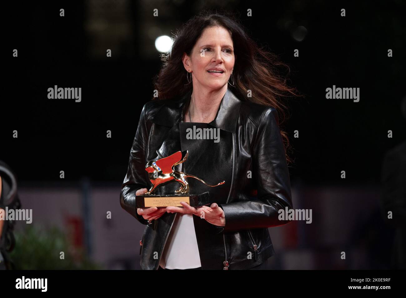 Laura Poitras poses with the Golden Lion for Best Film for "All the ...