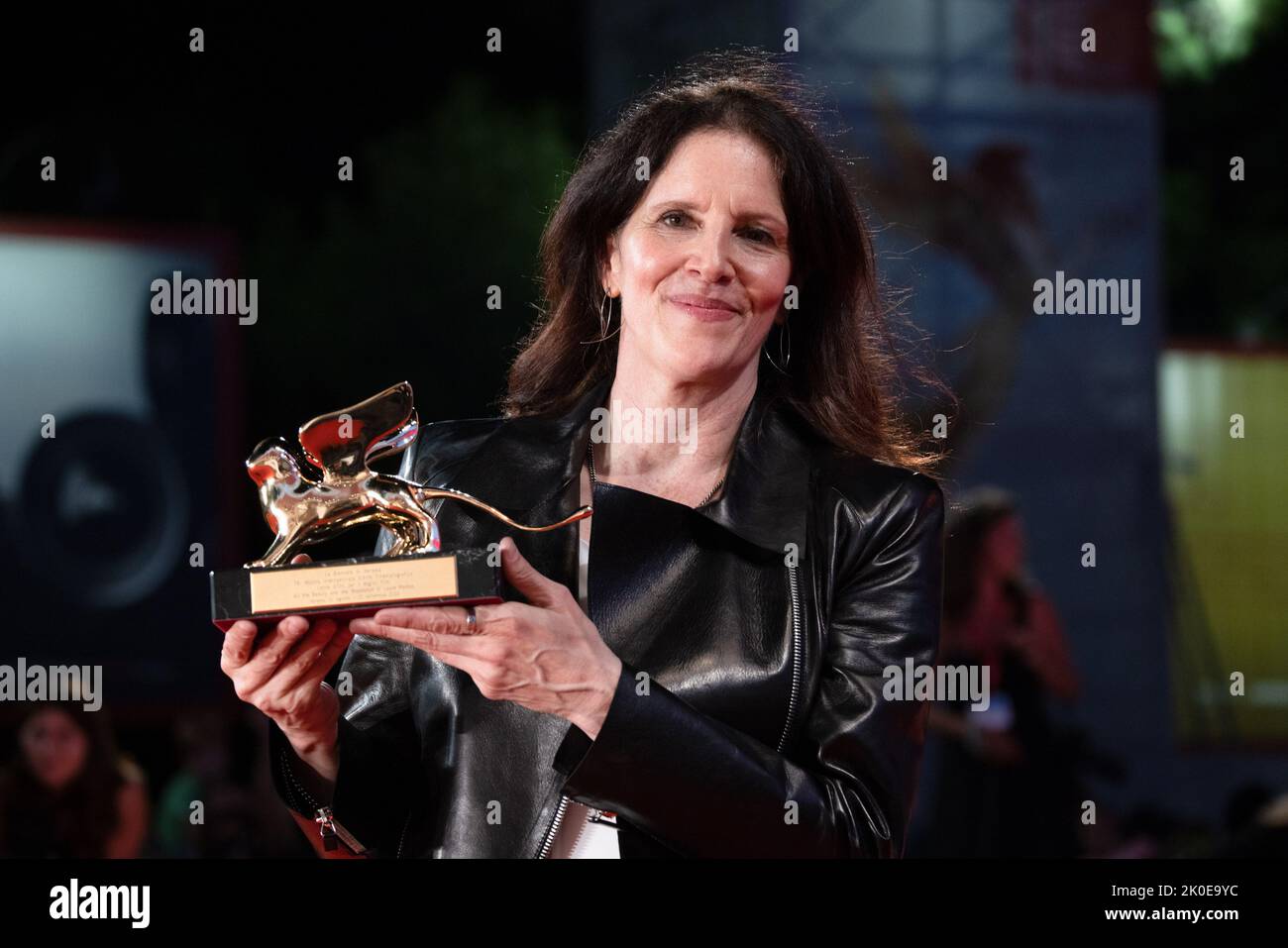 Laura Poitras poses with the Golden Lion for Best Film for "All the ...