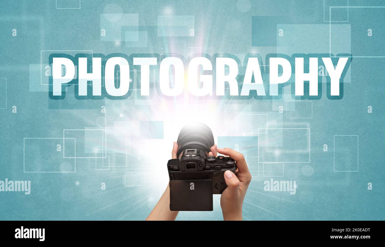 hand holding digital camera, traveling concept Stock Photo - Alamy