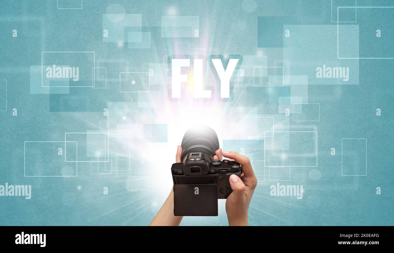 hand holding digital camera, traveling concept Stock Photo - Alamy