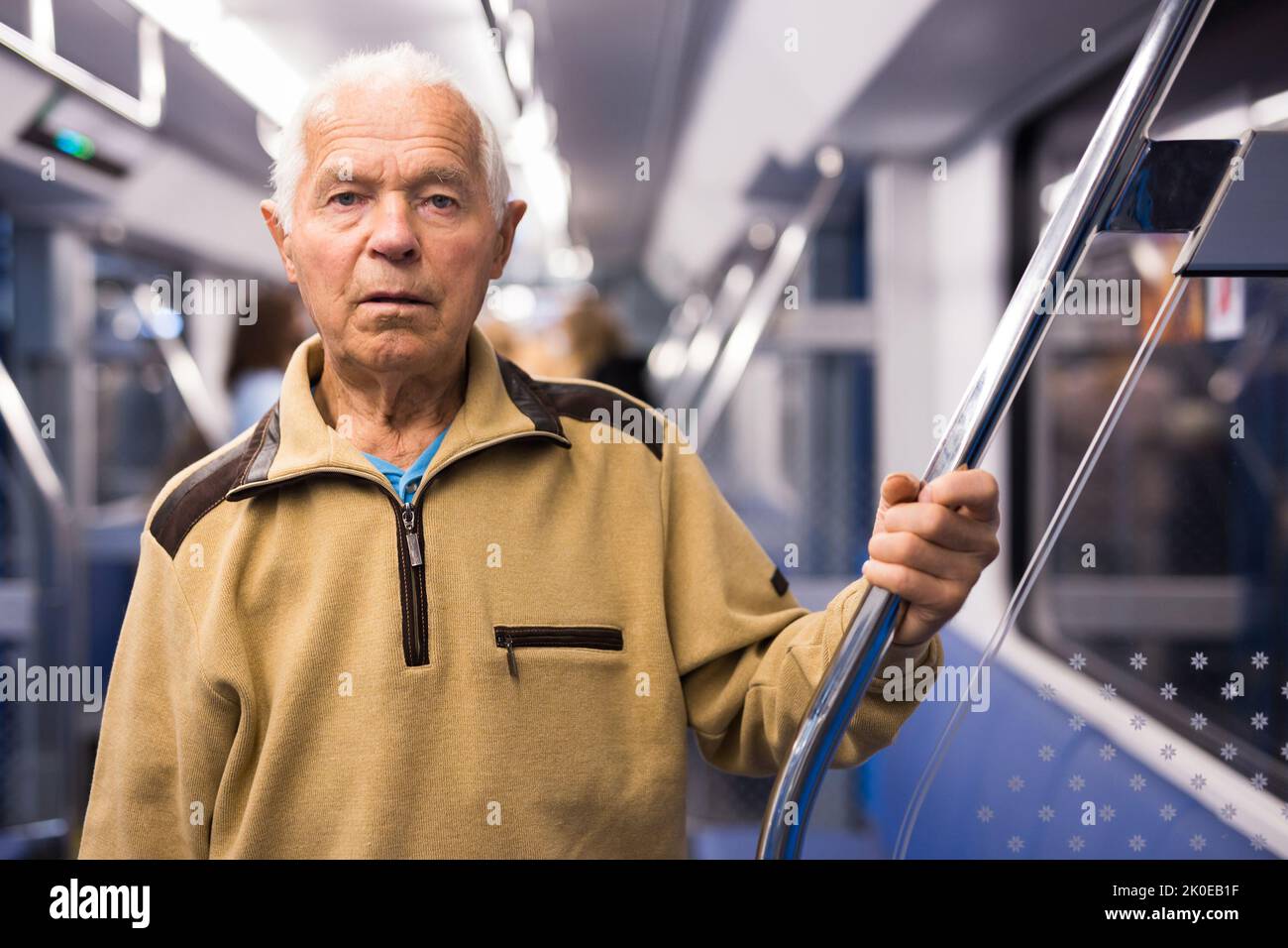 Old man in train hi-res stock photography and images - Alamy
