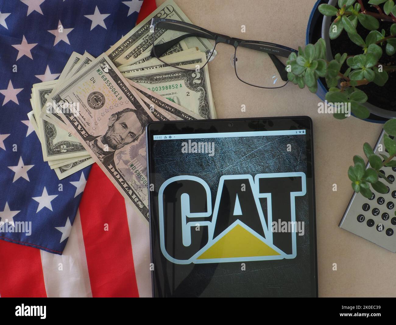 In this photo illustration, Caterpillar Inc. logo seen displayed on a ...
